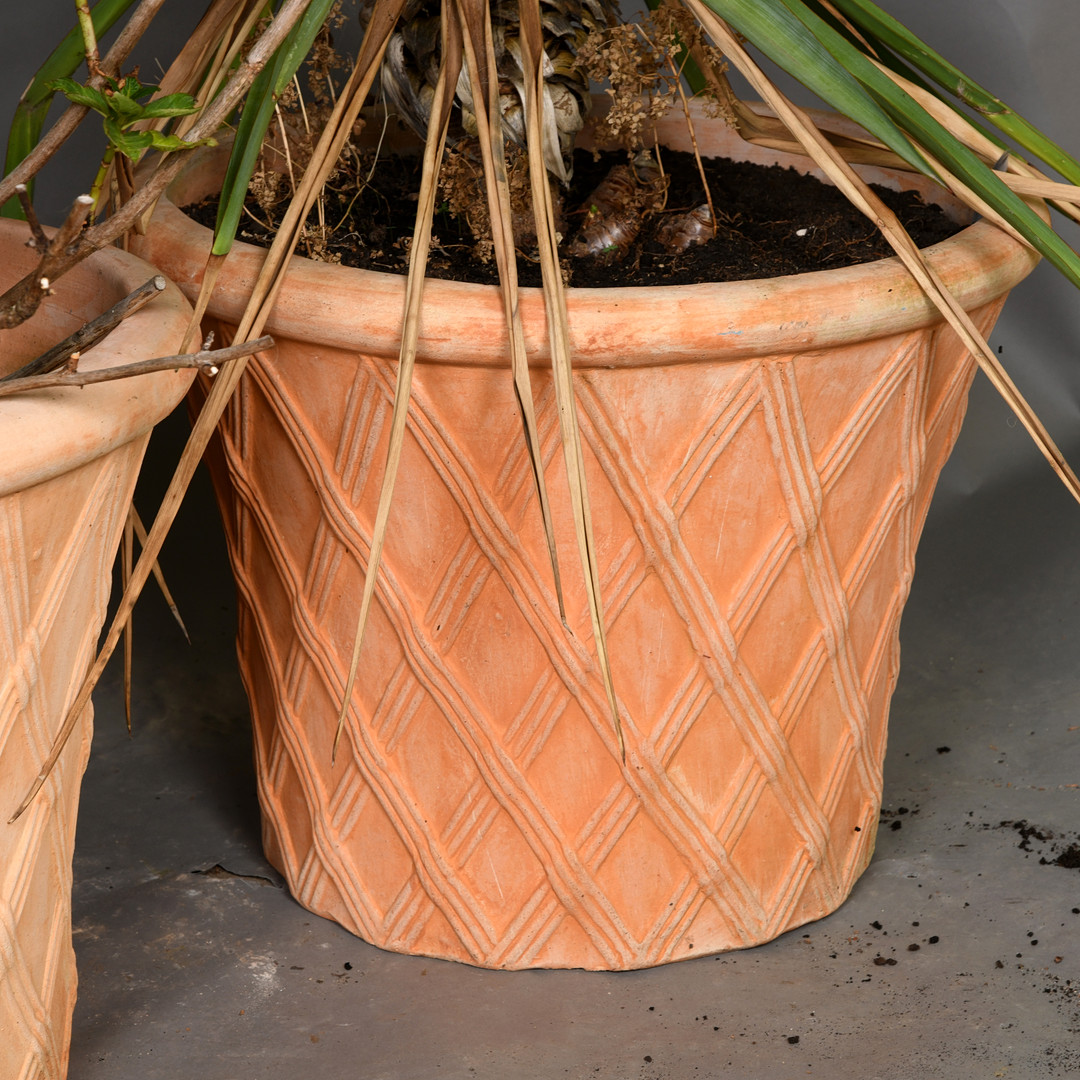 Images for 2389724. A SET OF THREE TERRACOTTA LATTICE DESIGN PLANTERS ...
