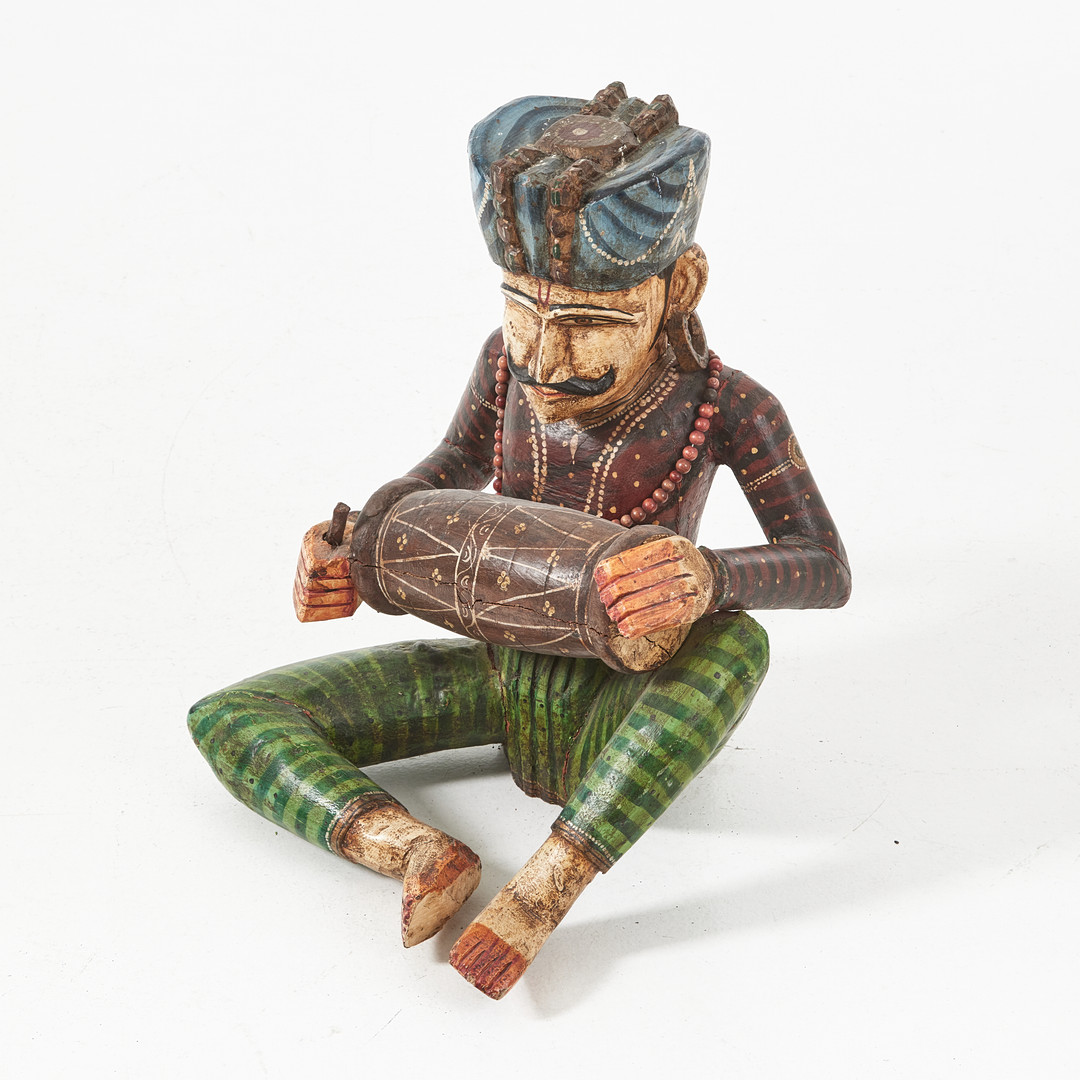 Images for 4842295. A late 20th century sculpture, man drum, cut and ...