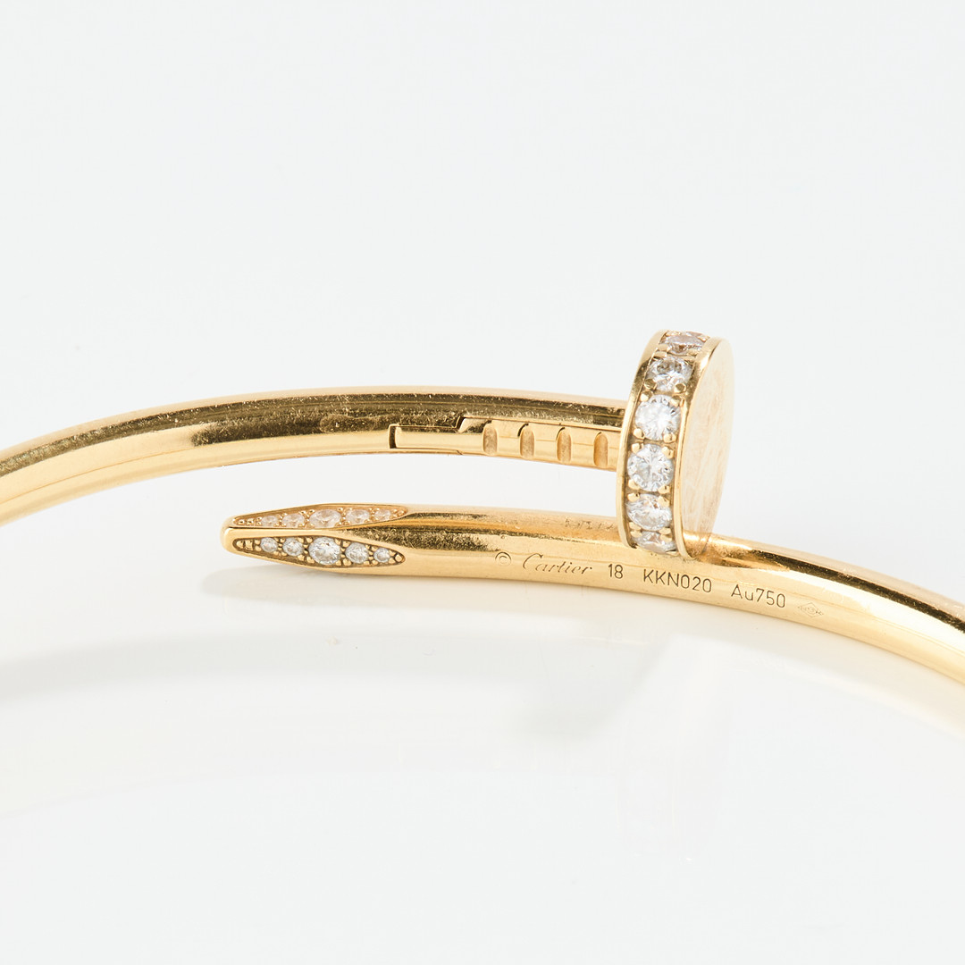 CARTIER. Bangle, “Juste un Clou”, classic model, 18K gold with diamonds ...