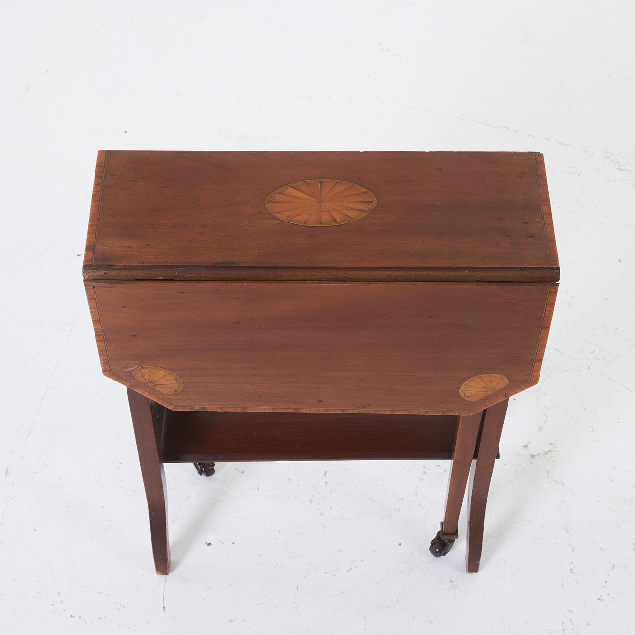 SMALL TABLE, knock-down model, marquetry, fold-out legs with casters ...