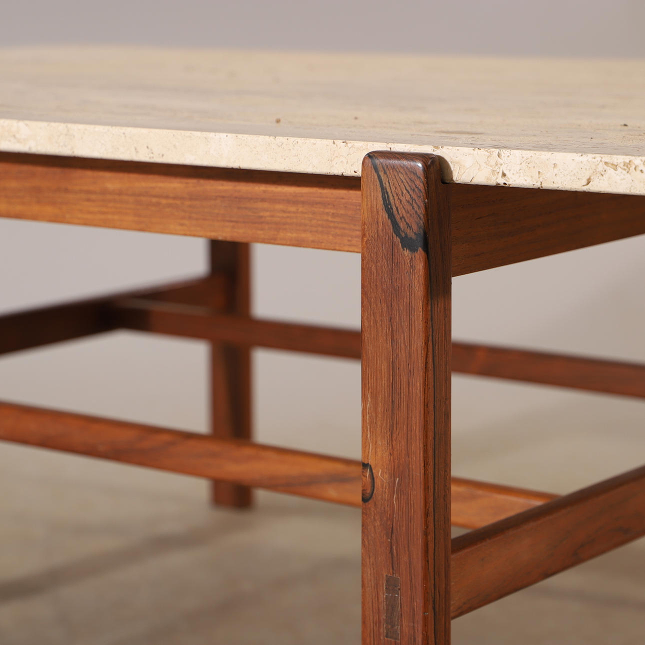 INGE DAVIDSSON. A jacaranda/travertine coffee table by Ernst Johansson ...