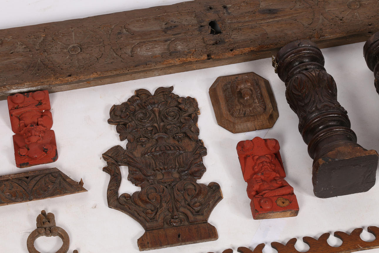 A LARGE COLLECTION OF 17TH CENTURY AND LATER WOOD CARVINGS AND PANELS ...