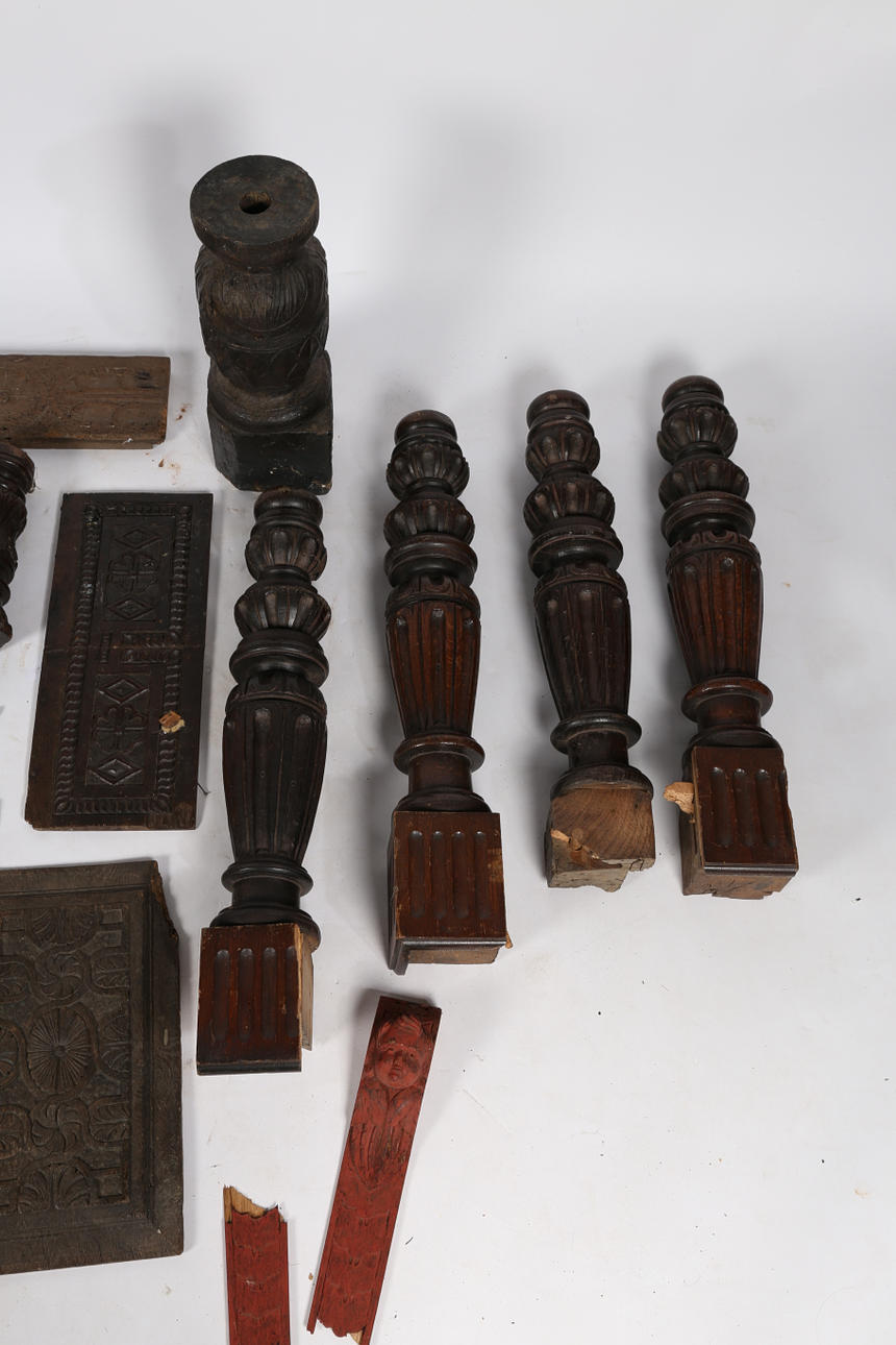 A LARGE COLLECTION OF 17TH CENTURY AND LATER WOOD CARVINGS AND PANELS ...