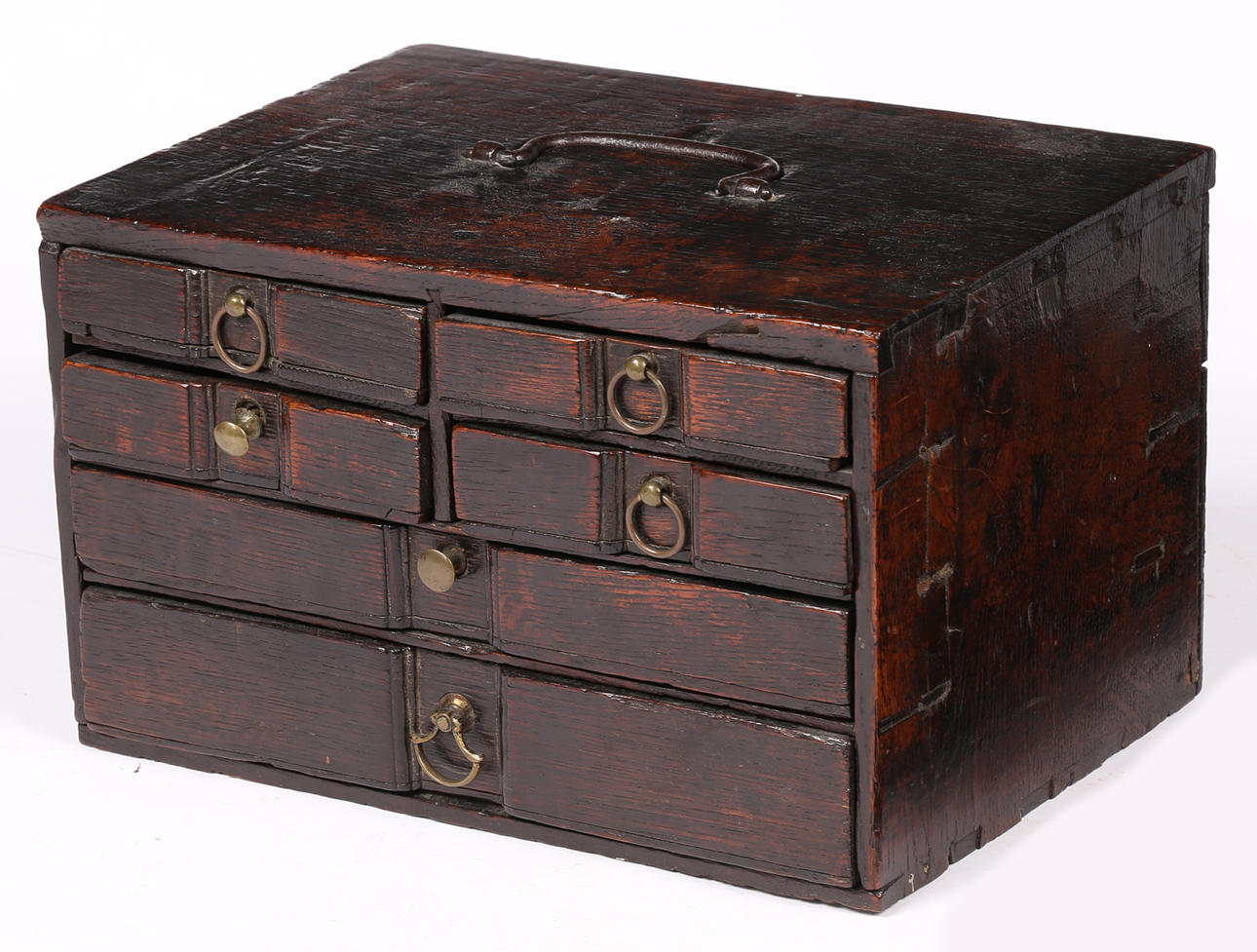 AN UNUSUAL SMALL BOARDED OAK TABLE-TOP CHEST OF DRAWERS, ENGLISH, CIRCA ...