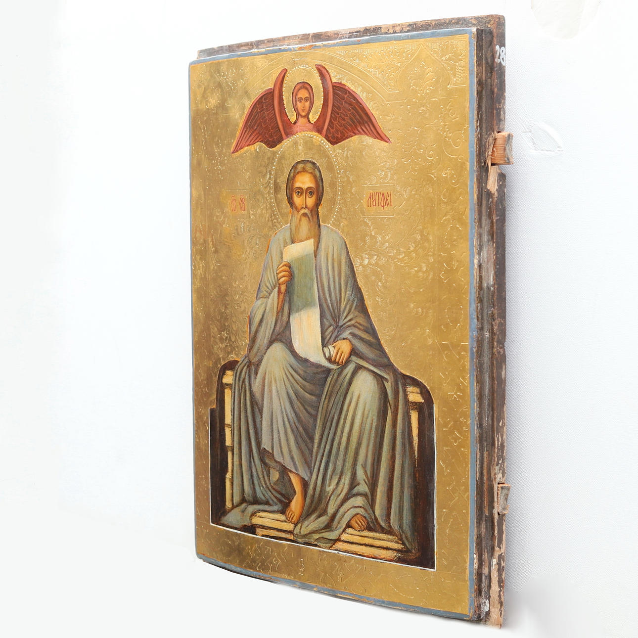 AN ICON, John the Evangelist, tempera and gold leaf on wood, 19th ...