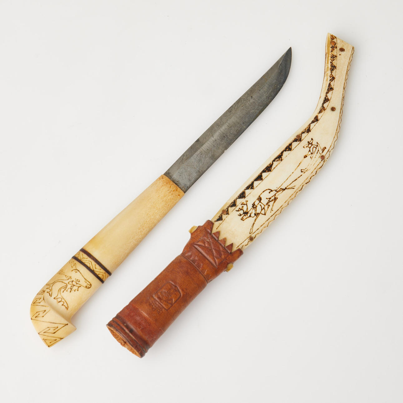 JOHANNES LAURI. Sami knife, sheath with leather and reindeer horns ...