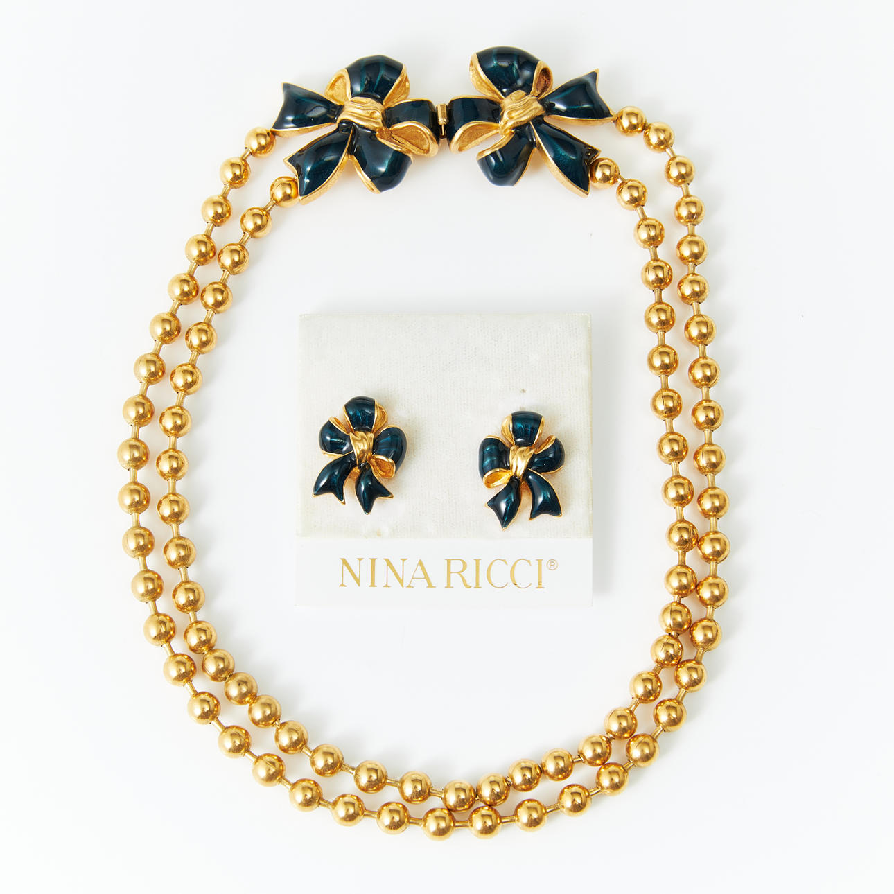NINA RICCI, collier, örhängen/clips, 1 par, förgylld metall, i form av ...