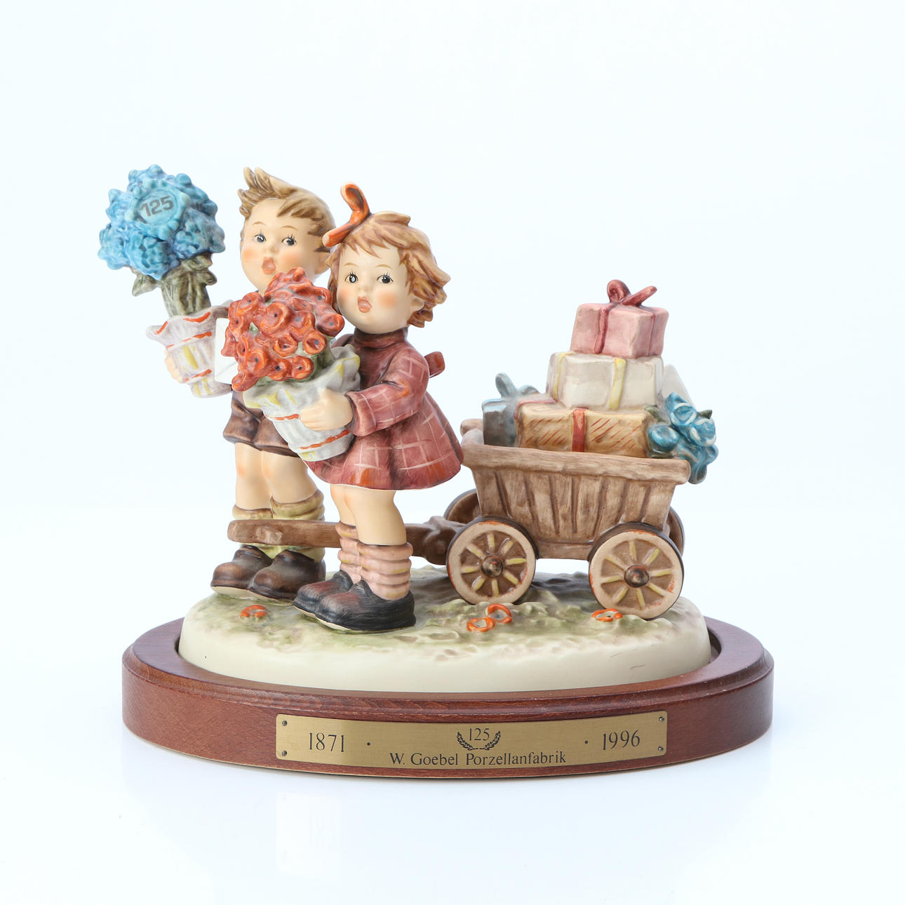 GOEBEL, FIGURE GROUP. Ceramics on wooden plinth. “Loves bounty”. Made ...