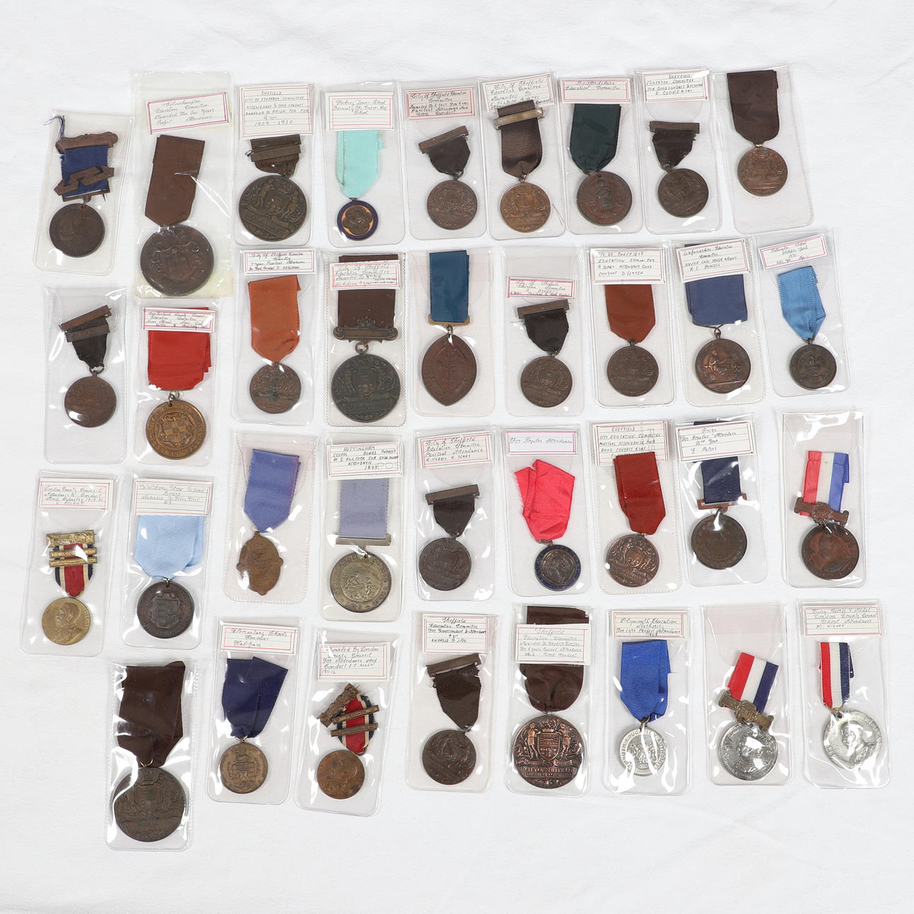 A COLLECTION OF VICTORIAN AND LATER SCHOOL ATTENDANCE MEDALS. Coins ...