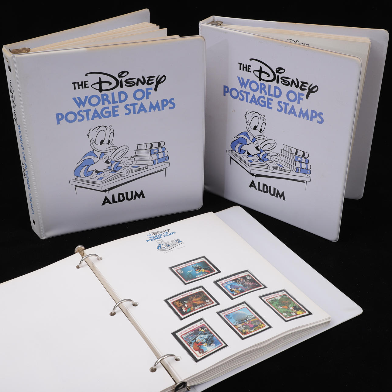 A collector's album of 3 stamps, “The Disney World of Postage Stamps ...