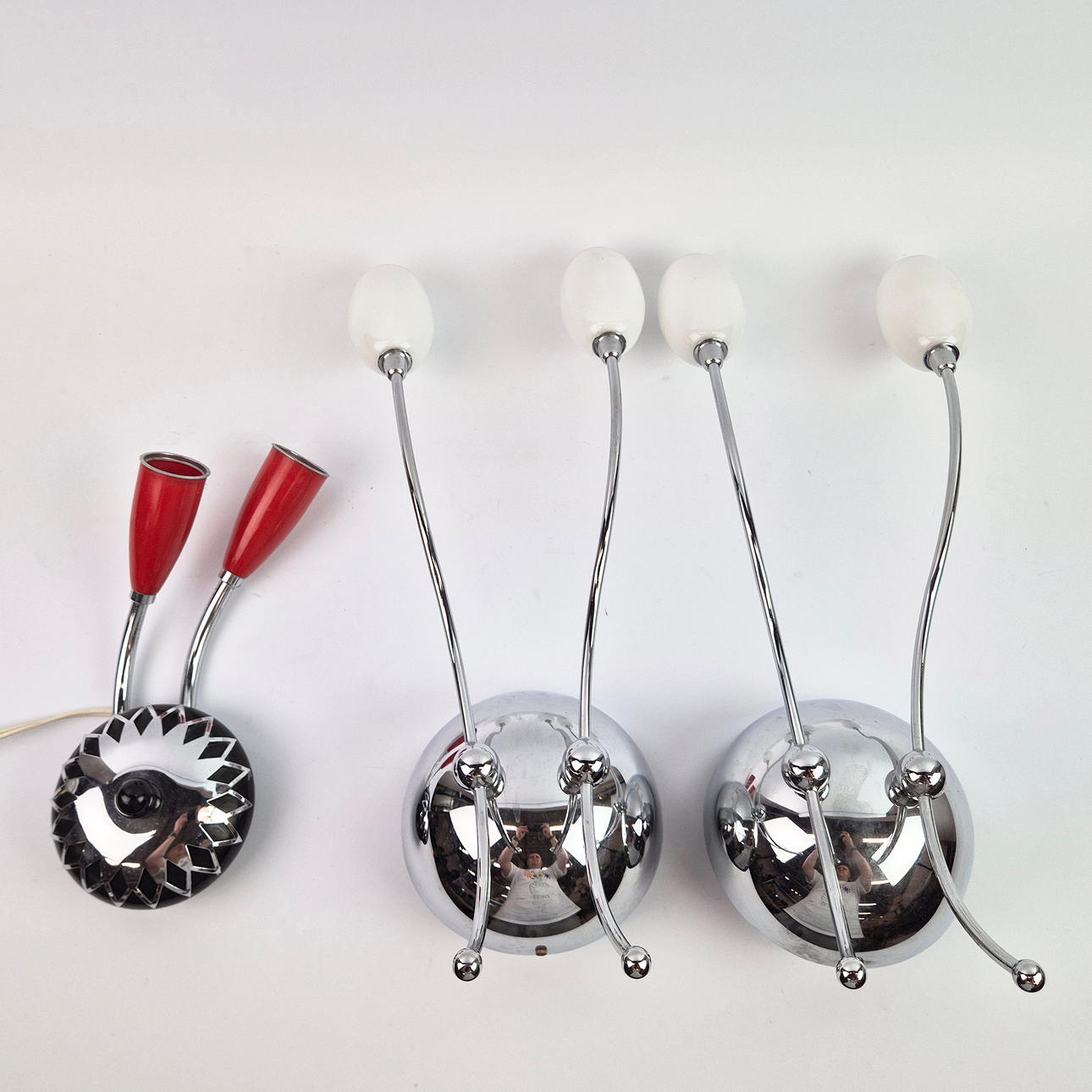 TWO 1980s ITALIAN CHROME AND GLASS TWIN ARM WALL LIGHTS, TOGETHER WITH ...