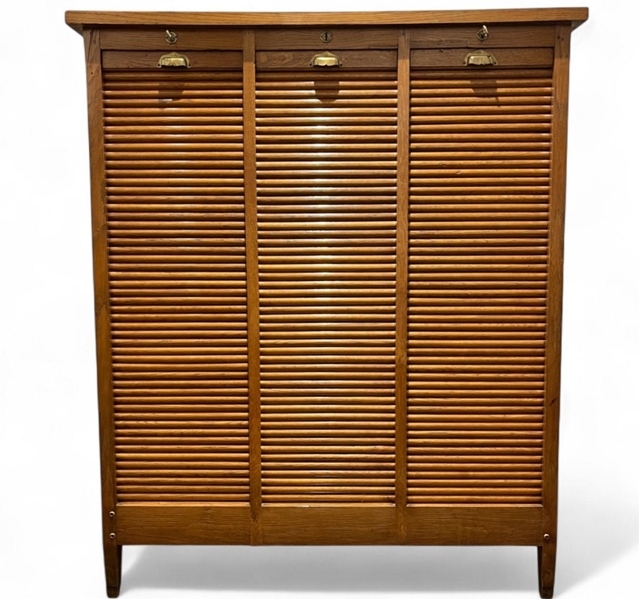 Triple roller shutter filing cabinet in American oak, from the first ...