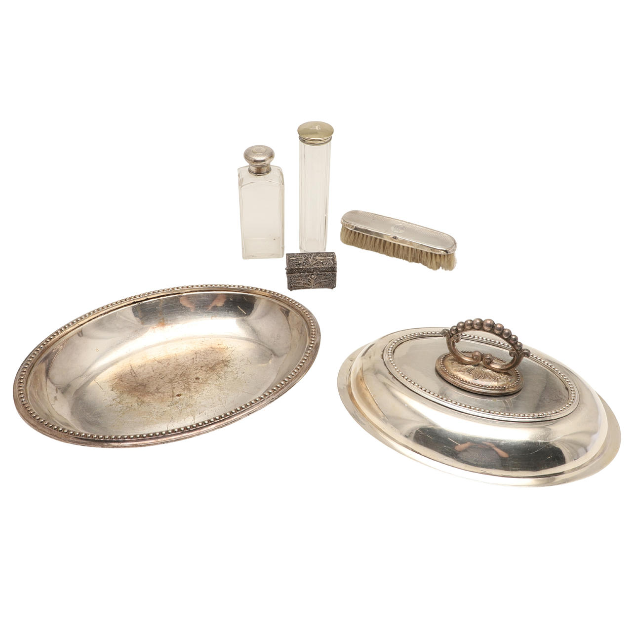 AN EASTERN WHITE METAL FILIGREE BOX, A SILVER TOPPED DRESSING TABLE JAR ...