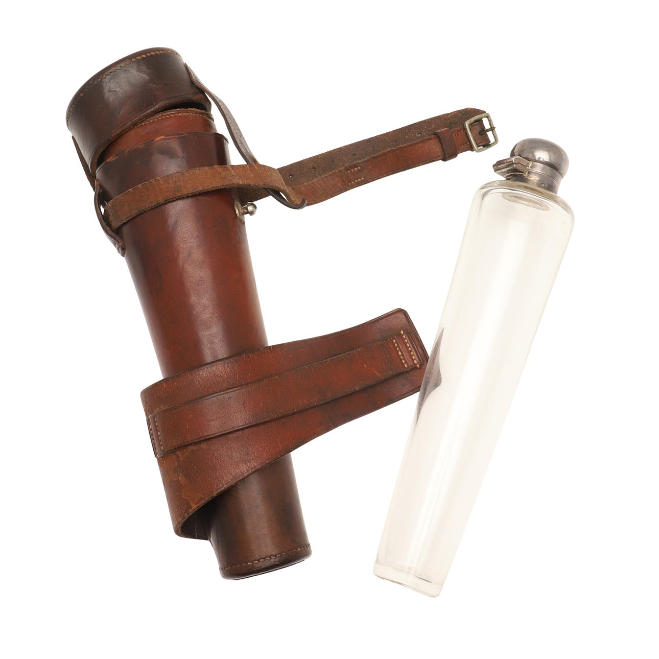 A SILVER MOUNTED GLASS CONICAL HUNTING SADDLE FLASK IN LEATHER CASE ...