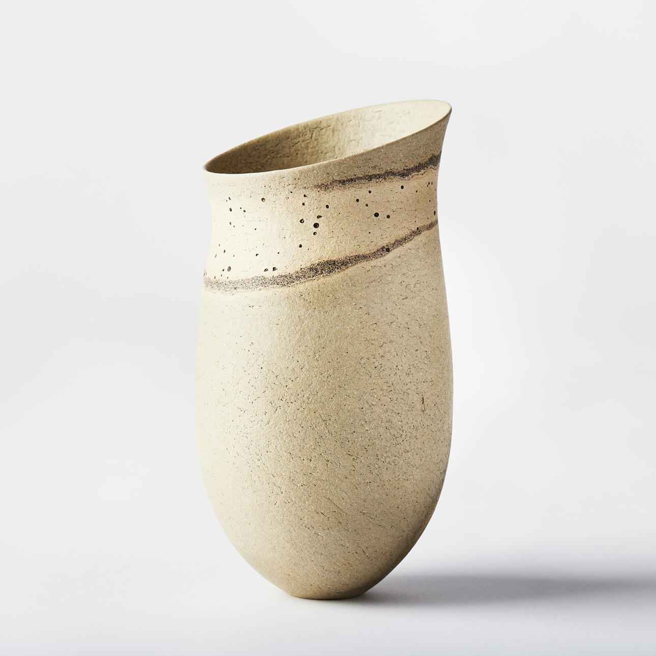 JENNIFER LEE. “Pale shale pot, tilted rim, speckled and dark haloed ...