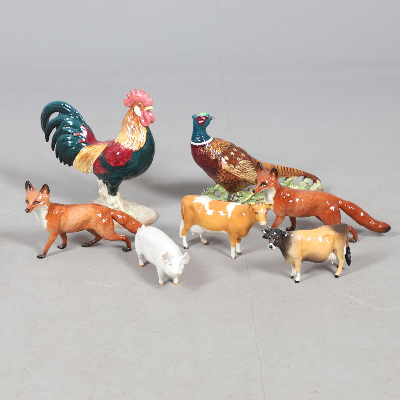 A BESWICK POTTERY MODEL OF A LEGHORN COCKEREL AND OTHER BESWICK ANIMALS ...