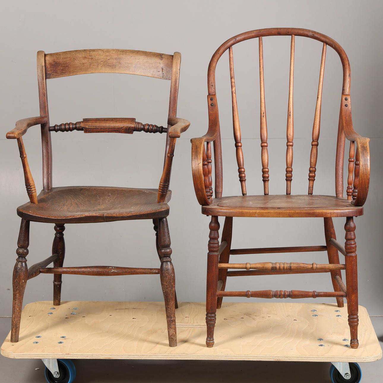 AN ELM SEATED ELBOW CHAIR AND A SPINDLE BACK ELBOW CHAIR (2). Furniture ...