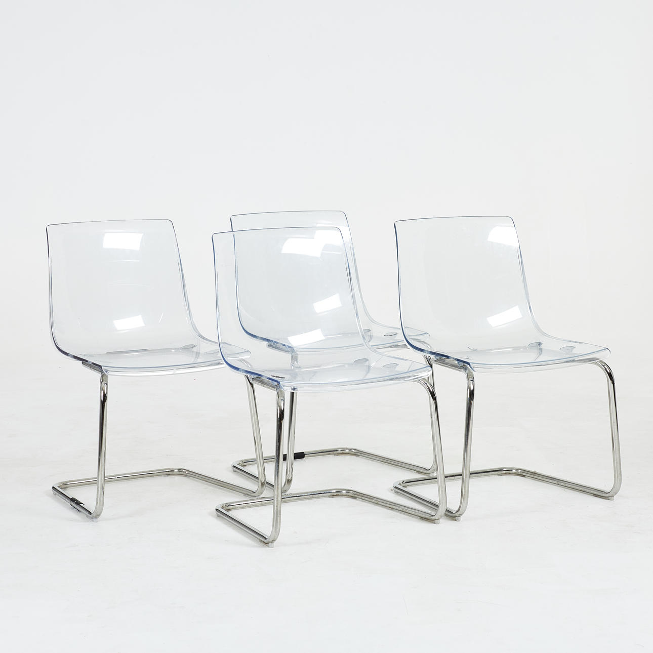 CARL ÖJERSTAM. 4 pcs, “Tobias chair”, Ikea, plexi, chromed steel base ...