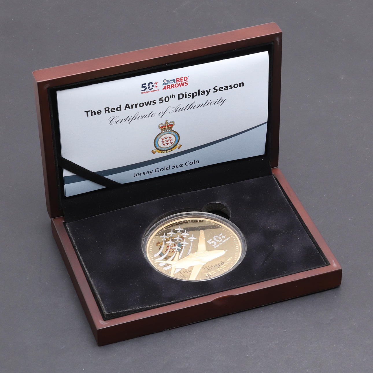 AN ELIZABETH II RED ARROWS DISPLAY SEASON 5OZ GOLD COIN, 2014. Coins ...