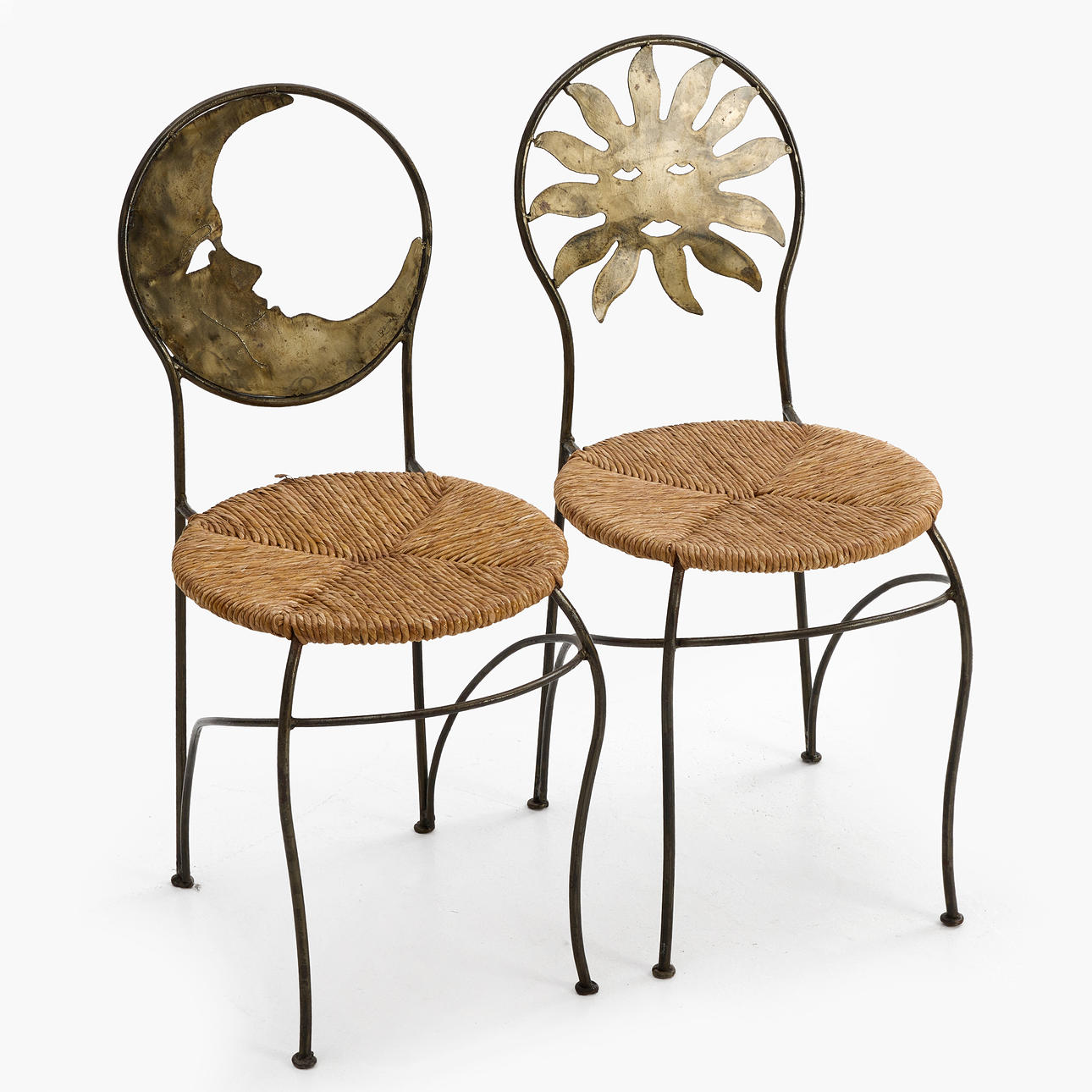 CHAIRS, a pair, motif of sun and moon, iron frame with braided seat ...