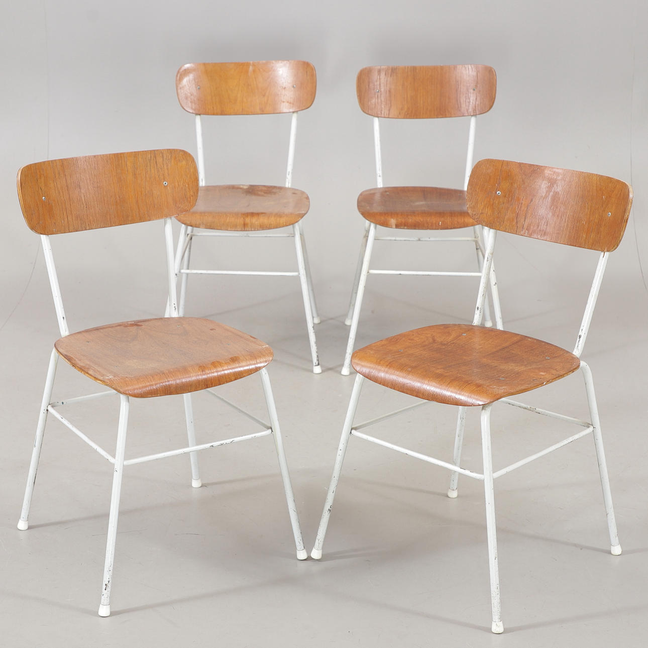 A set of four teak/metal chairs, second half of the 20th century ...