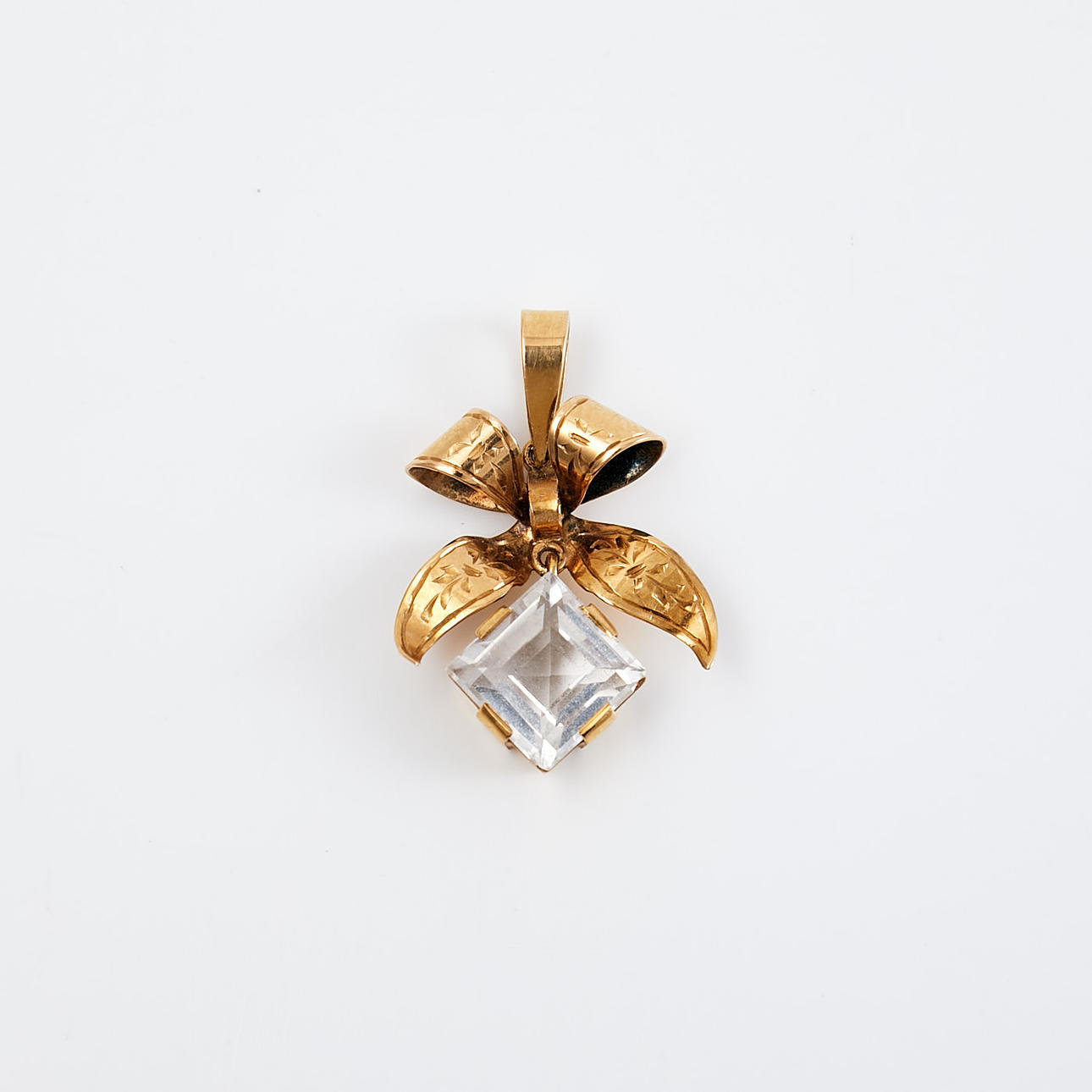 A PENDANT, 18k gold, rosette shape with rock crystal, Heribert ...