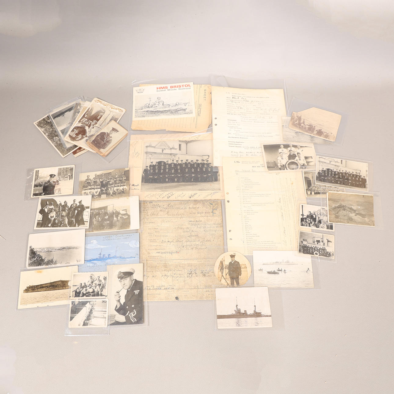 A COLLECTION OF WORLD WAR TWO DOCUMENTS AND PHOTOS TO ALBERT LEE MAA RN (QTY). Weapons ...
