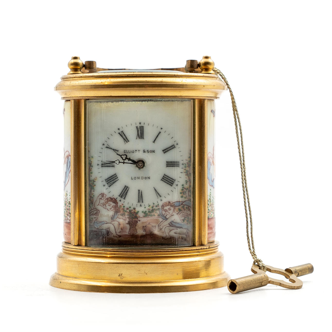 ELLIOTT & SON. A brass & enamel travel clock, early 20th century ...