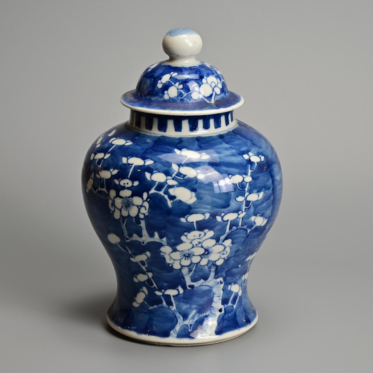 A CHINESE BLUE AND WHITE PORCELAIN PRUNUS VASE AND COVER, 19/20TH ...