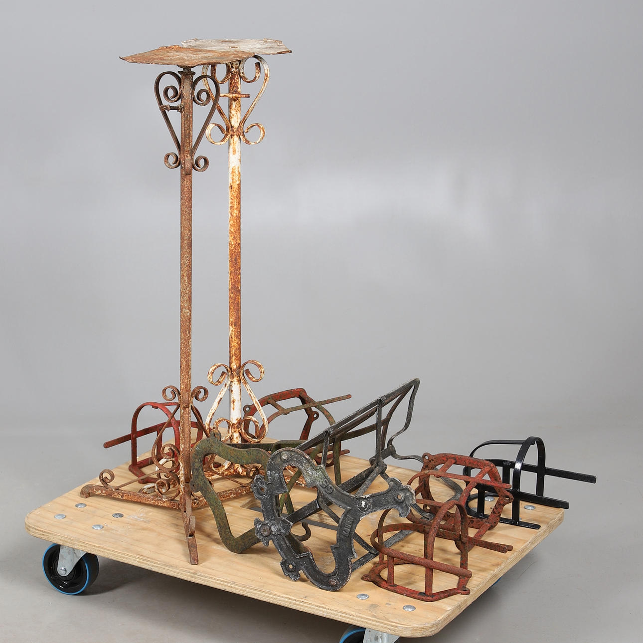 A PAIR OF WROUGHT IRON STANDS, A PAIR OF WROUGHT IRON SADDLE RACKS ETC ...