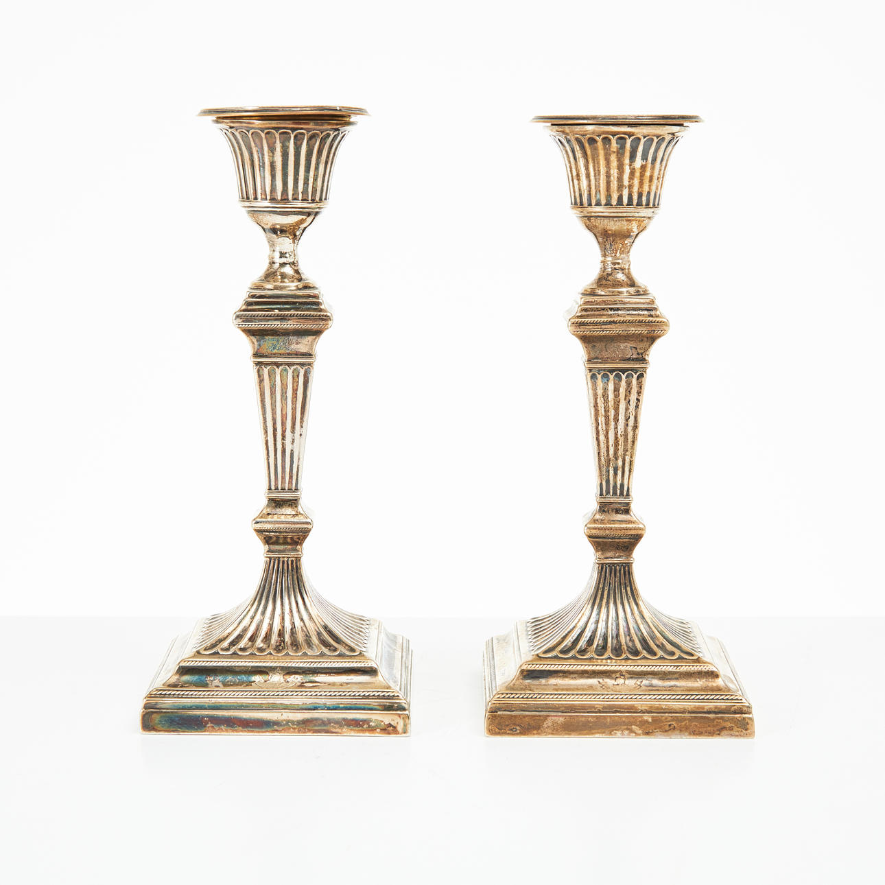A pair of sterling silver candlesticks, William Hutton & Sons London ...