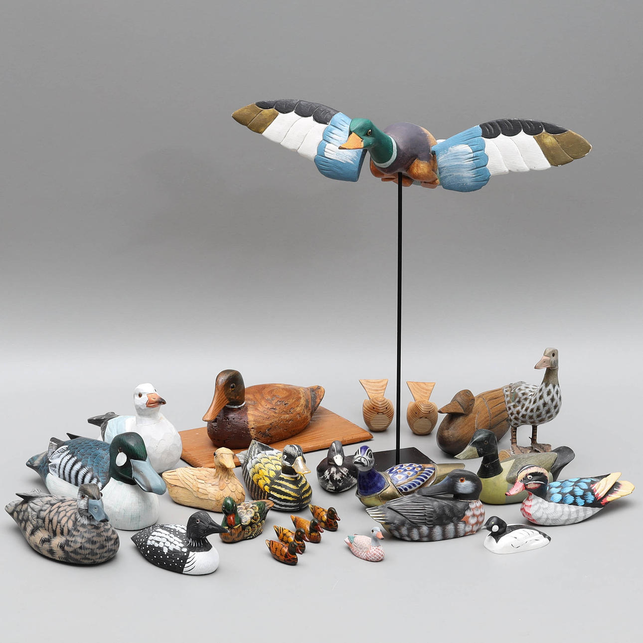 A collection of birds, 24 pieces, wood & ceramics, 20th century ...