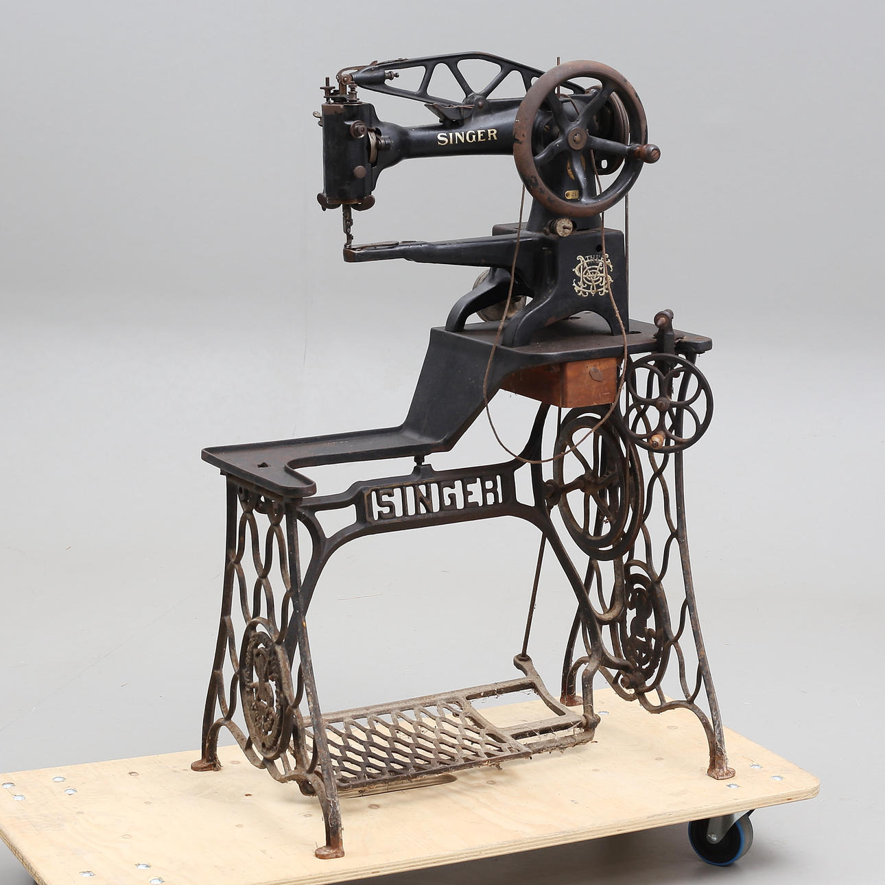 A SEWING MACHINE FOR SHOEMAKING, cast iron, Singer, first part of the ...