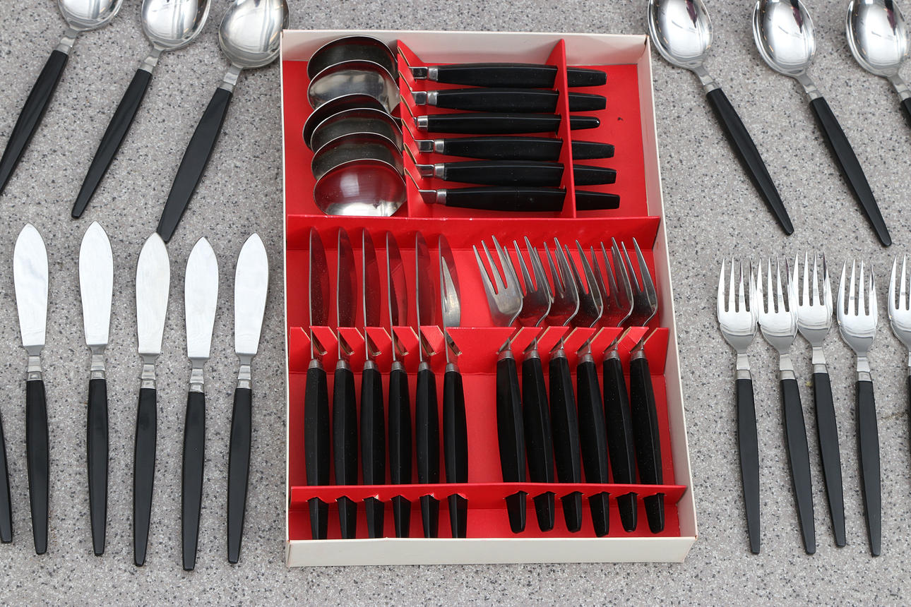 CUTLERY SET, 36 PIECES. Stainless steel with black plastic handles ...
