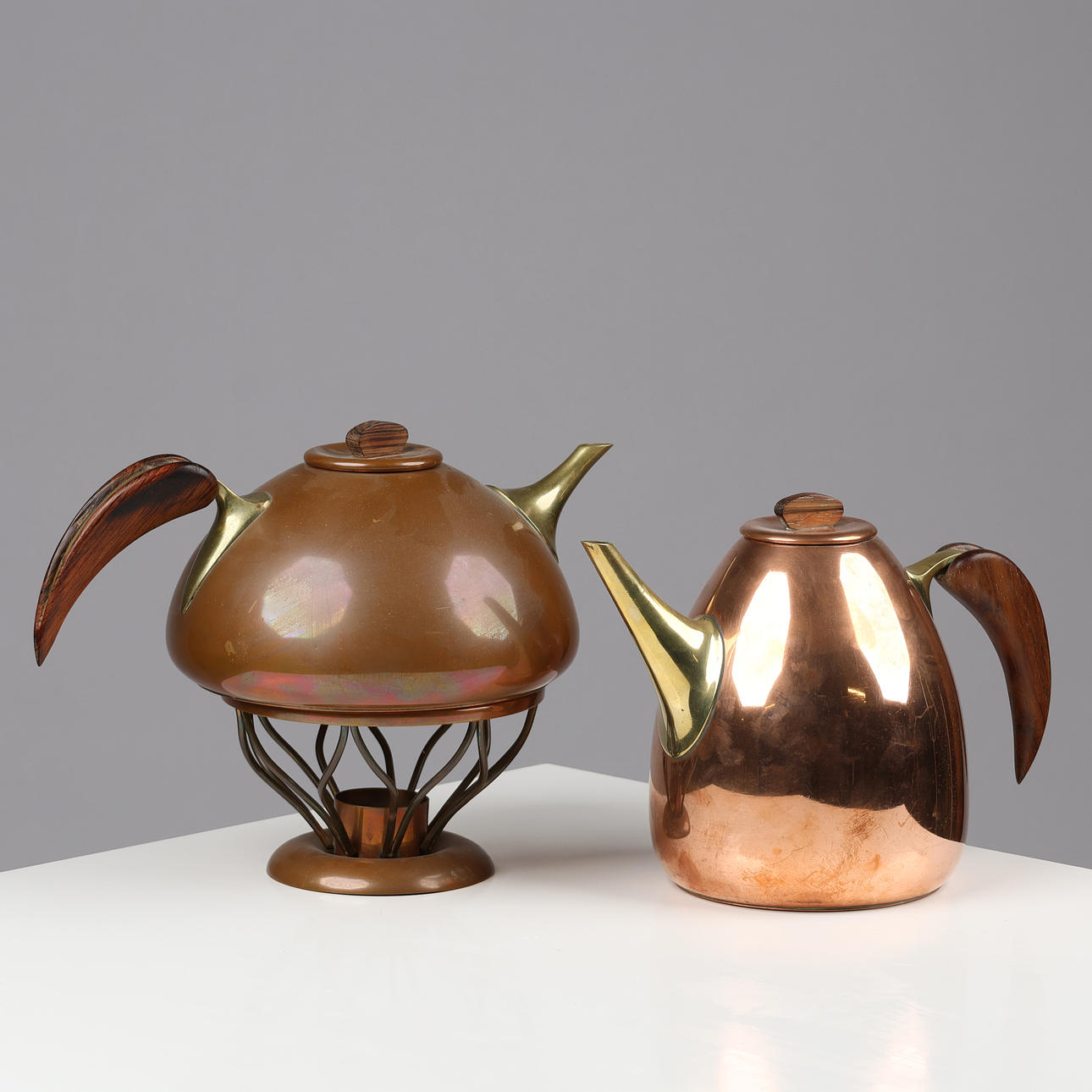 KARL HAGENAUER (1898–1956). Copper, brass and rosewood teapot and ...