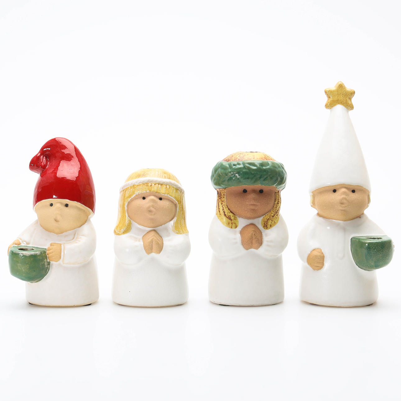 LISA LARSON. A set of four Luciatåg figurines from the series Advent ...