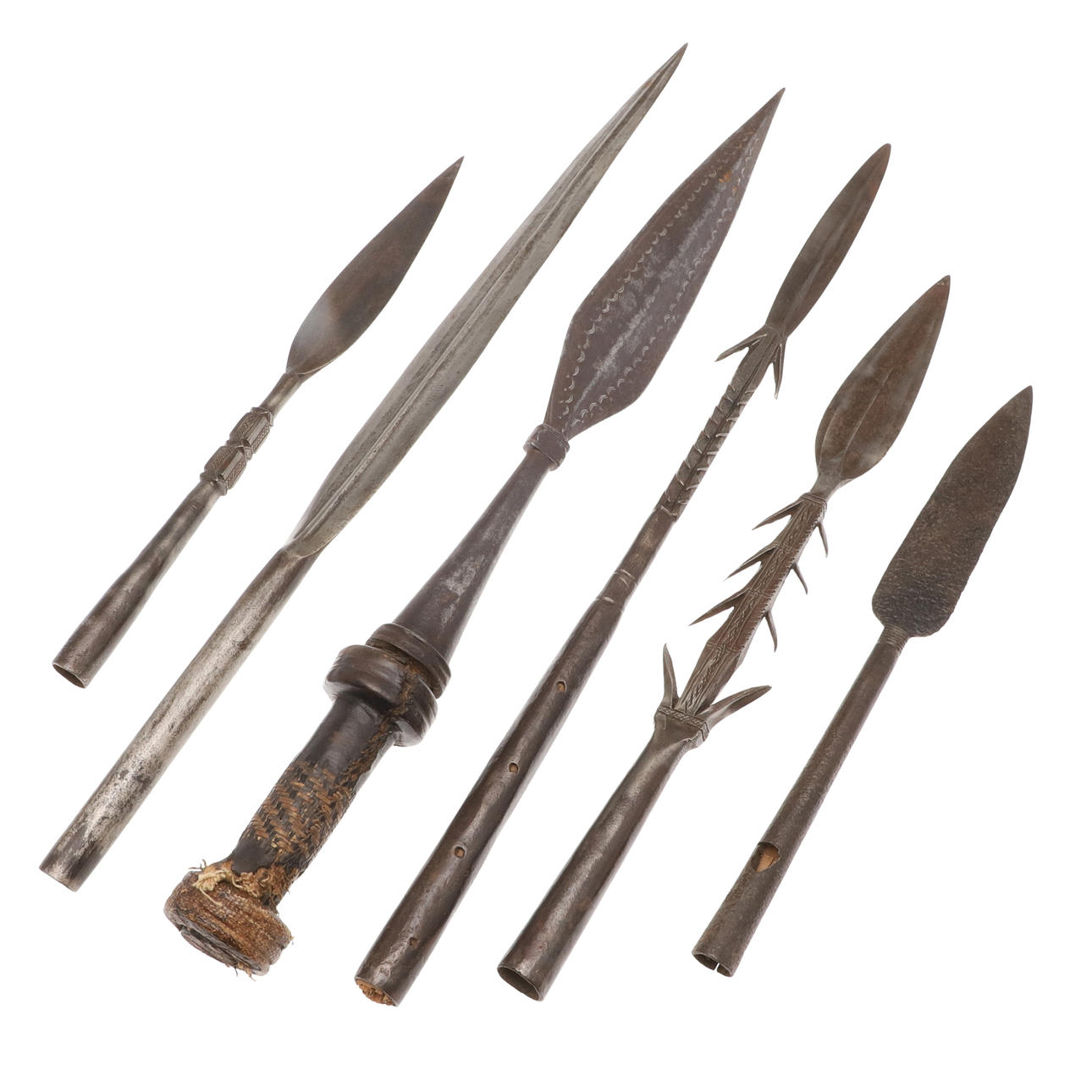 A COLLECTION OF SIX AFRICAN SPEAR HEADS OF VARIOUS DESIGNS. Weapons ...