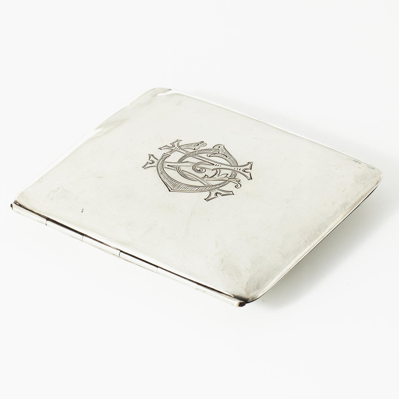 A silver cigarette case, stamped with Swedish import stamps, 20th ...