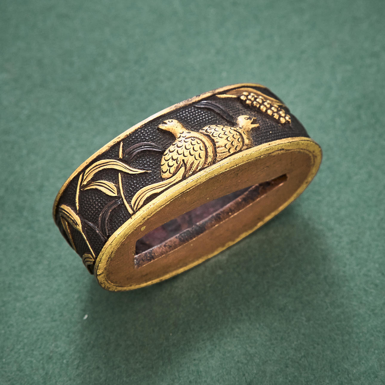 FUCHI and KASHIRA, Japanese, shakudo with gold inserts, decor of quails ...