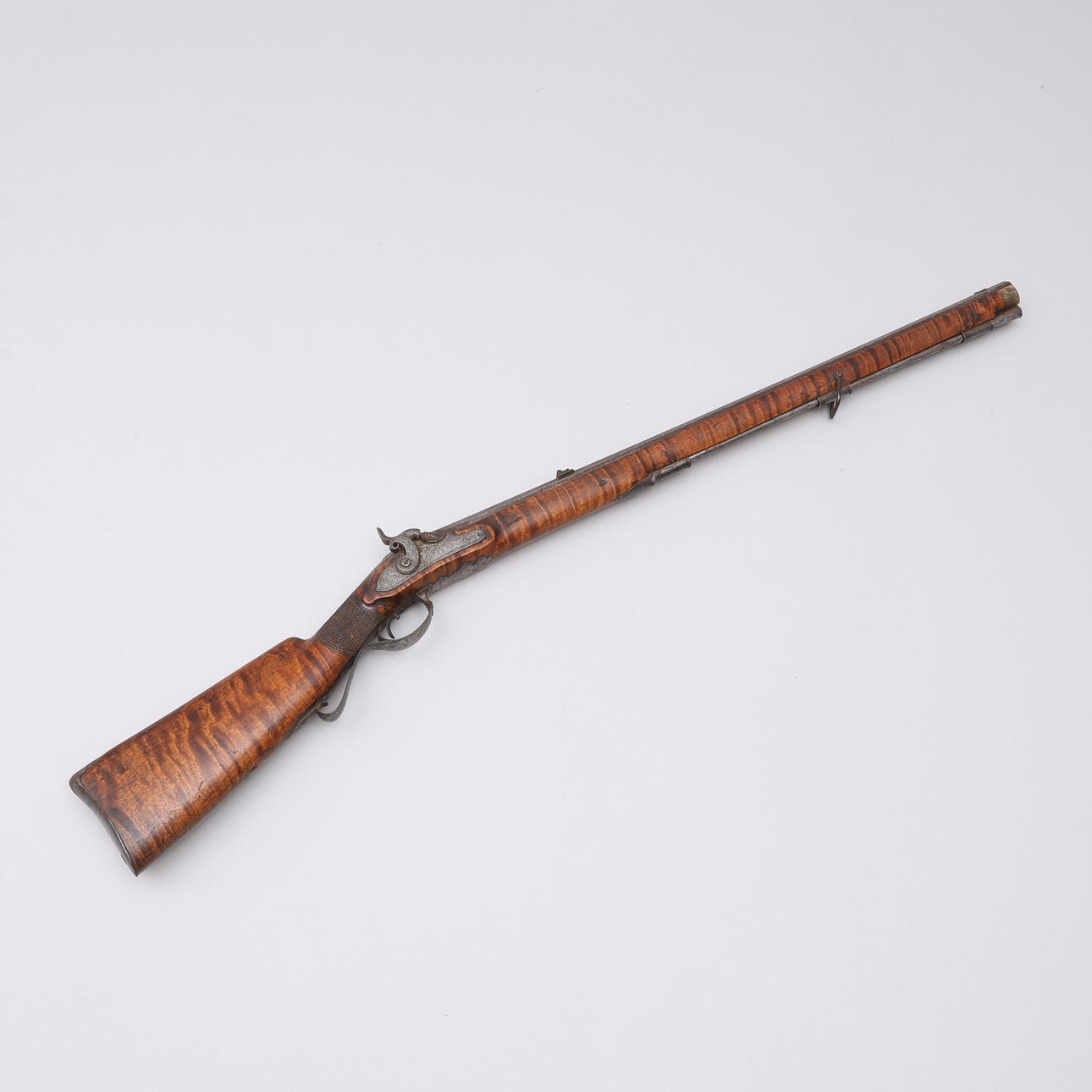 A FLINTLOCK RIFLE, CONVERTED FROM FLINTLOCK, fluted barrel, 17th/19th ...
