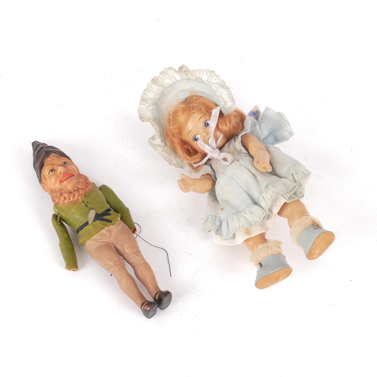 A pair of dolls, blue in the shape of Santa Claus, celluloid, first ...