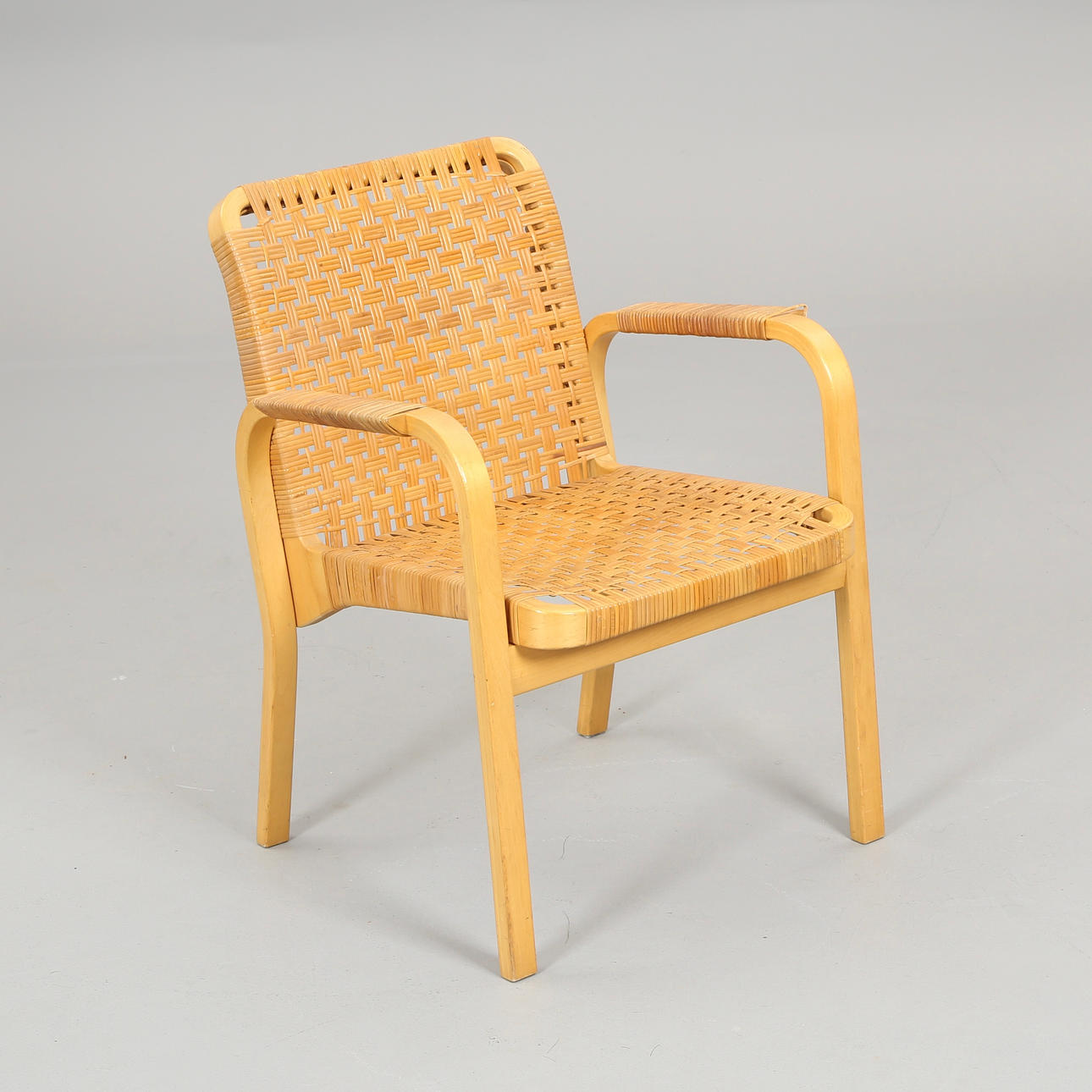 ALVAR AALTO. Artek. Birch wood armchair with shroud, model 45 ...