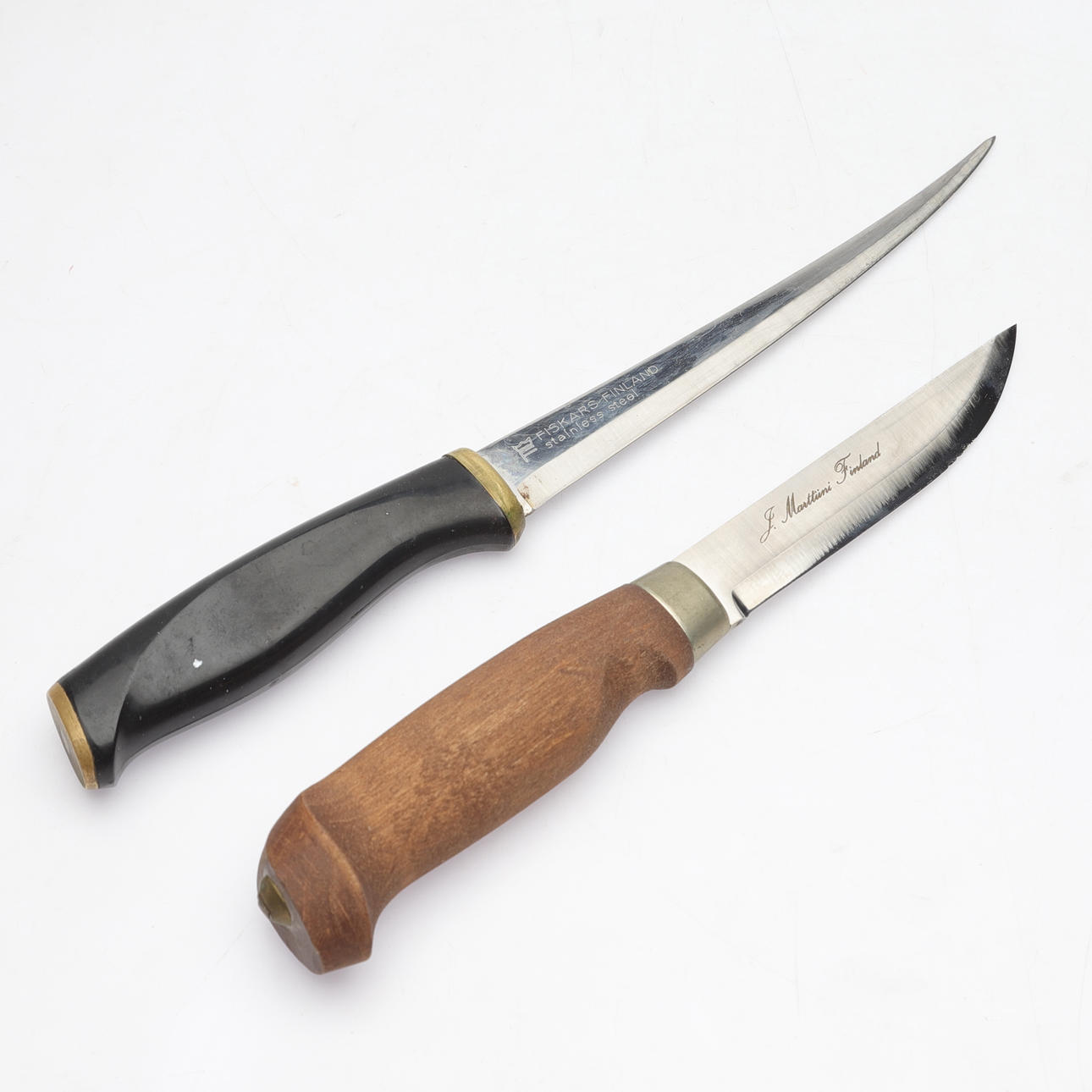 Two Finnish knives, J Marttiini and Fiskars, 20th century. Weapons ...