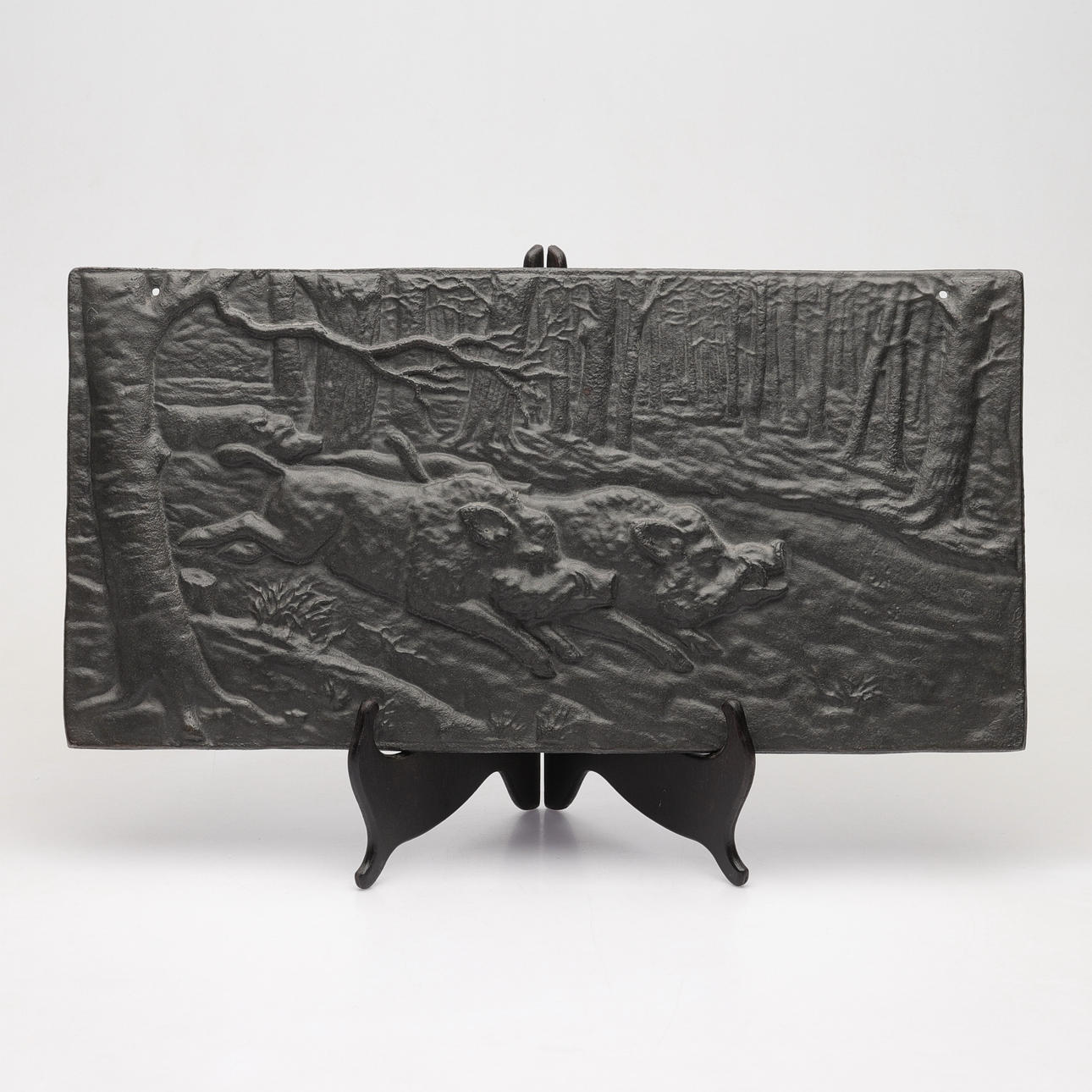 A wall relief, boar in forest landscape, cast iron, 20th century ...