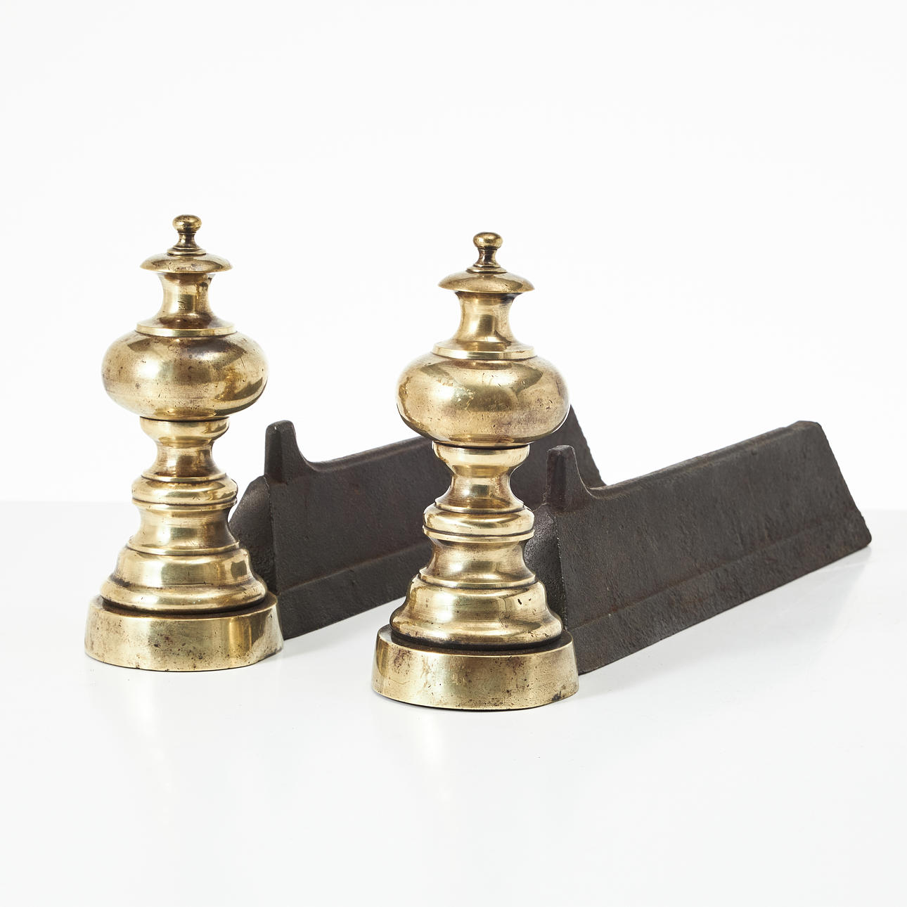 A pair of fire dogs, cast iron and brass. Miscellaneous - Miscellaneous ...