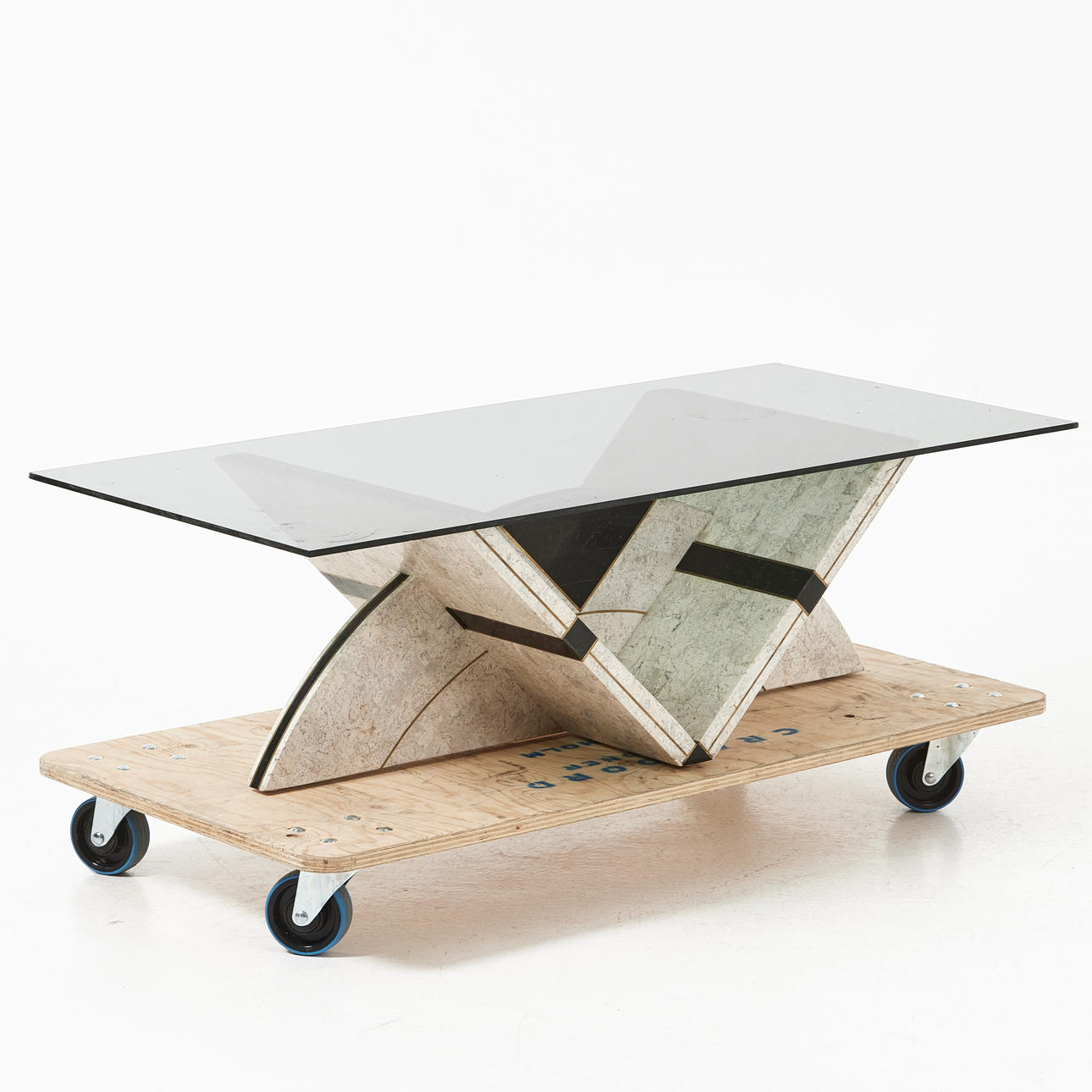 COFFEE TABLE, 1970/80's, leg stand veneered with travertine in black and white, brass inlays ...