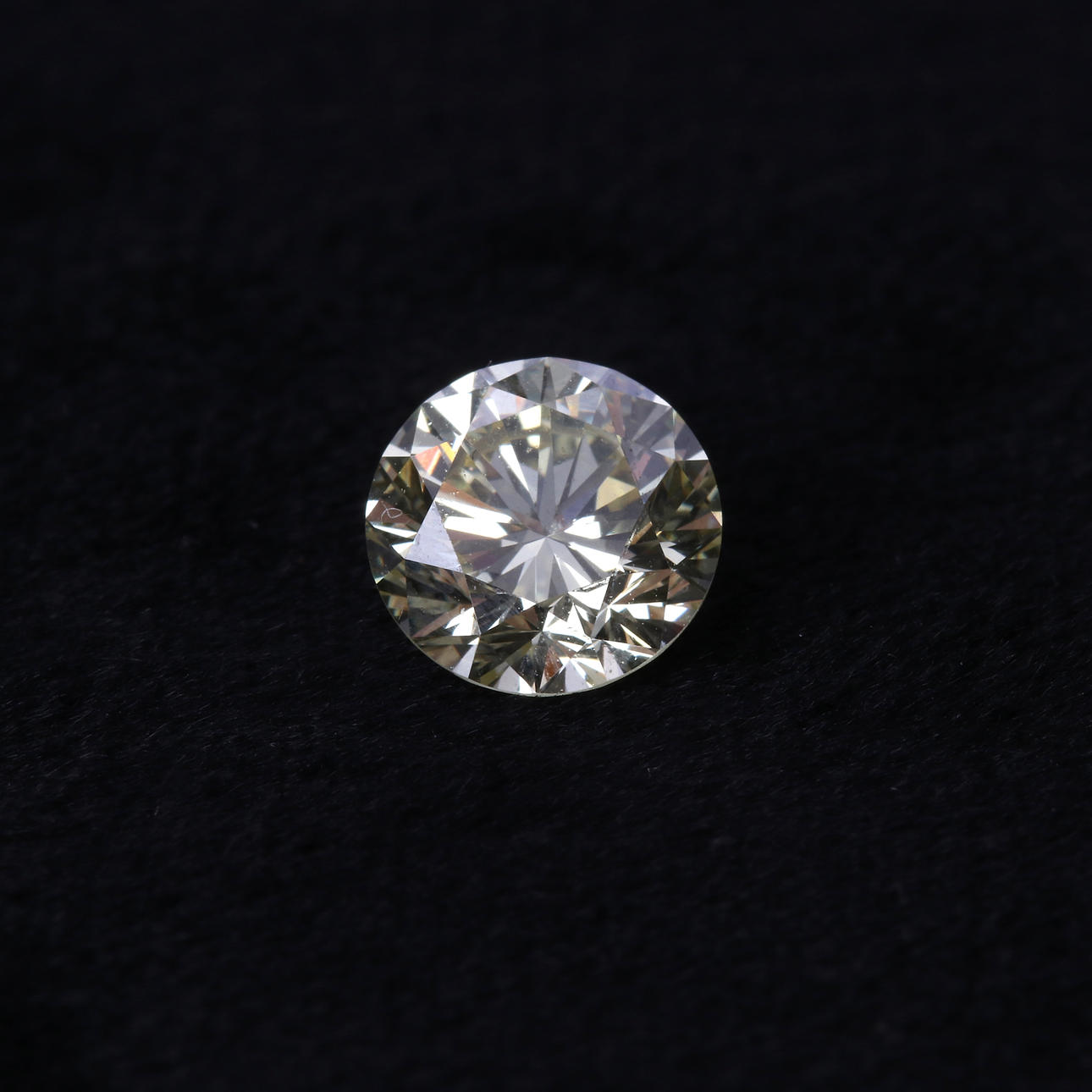 DIAMANT, OINFATTAD. En rund briljantslipad naturlig diamant 1,56 ct ...