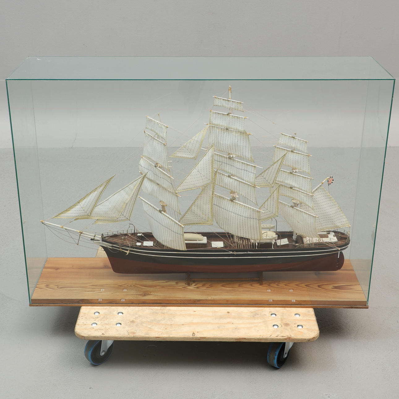 MODEL SHIP, depicting “Cutty Sark” (1869), in glass display case ...