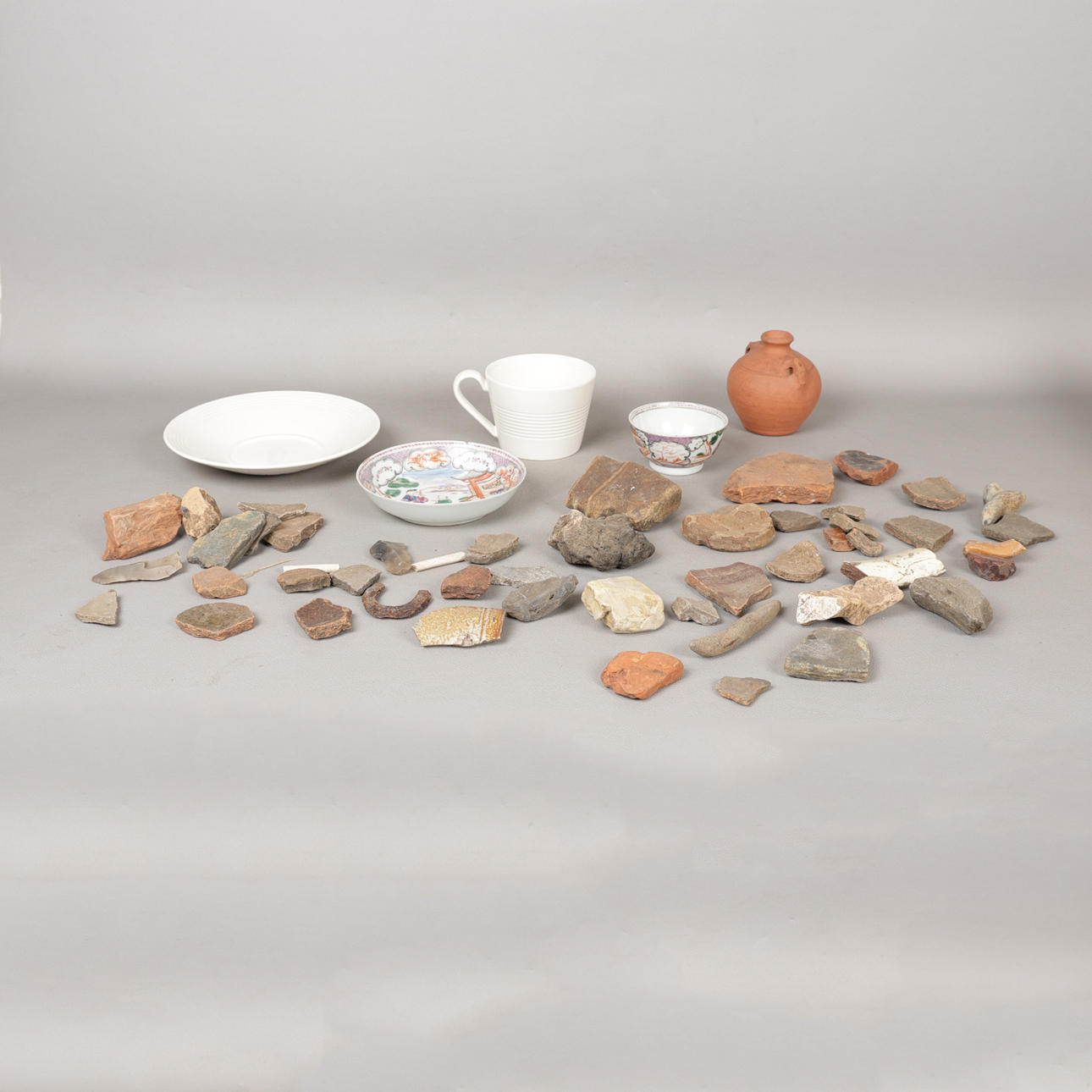 A LIBERTY TERRACOTTA COSTREL, WEDGWOOD BREAKFAST CUP AND SAUCER ...