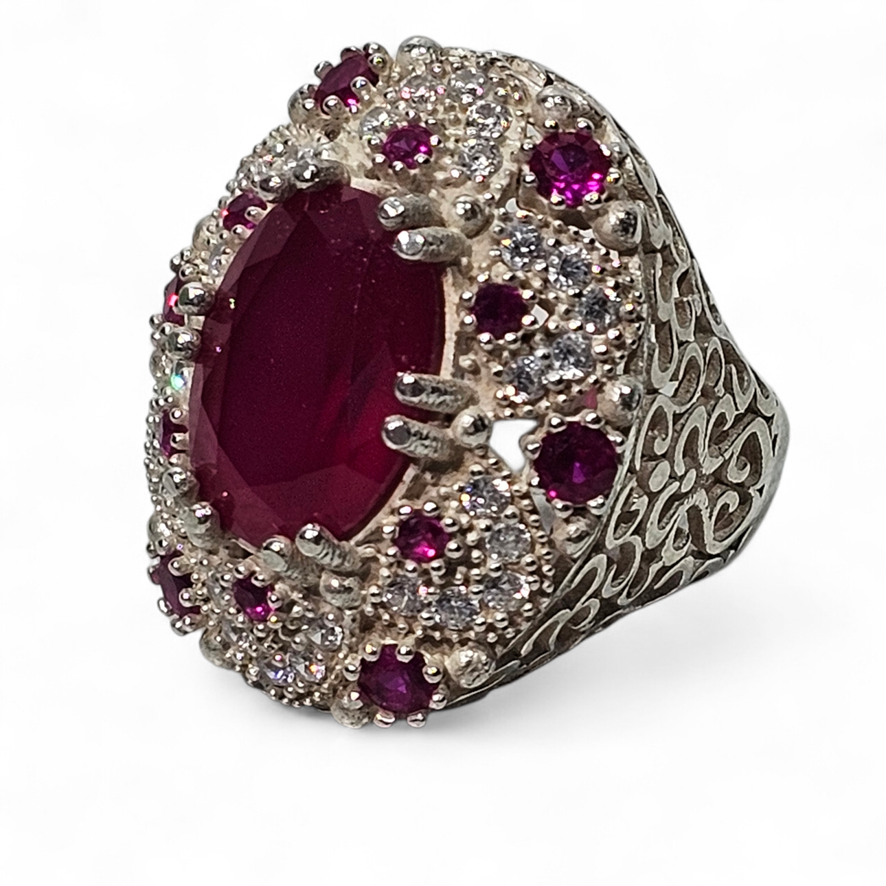 Large ruby zircon ring with a carved and silver-tinted frame. NO. 11 ...